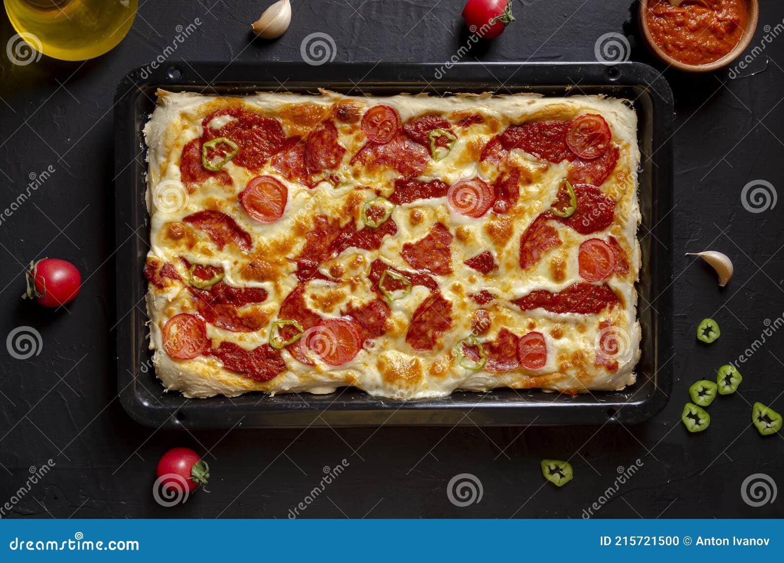 Detroit-style Pizza. Square Pepperoni Pizza with Sauce Stock Photo ...