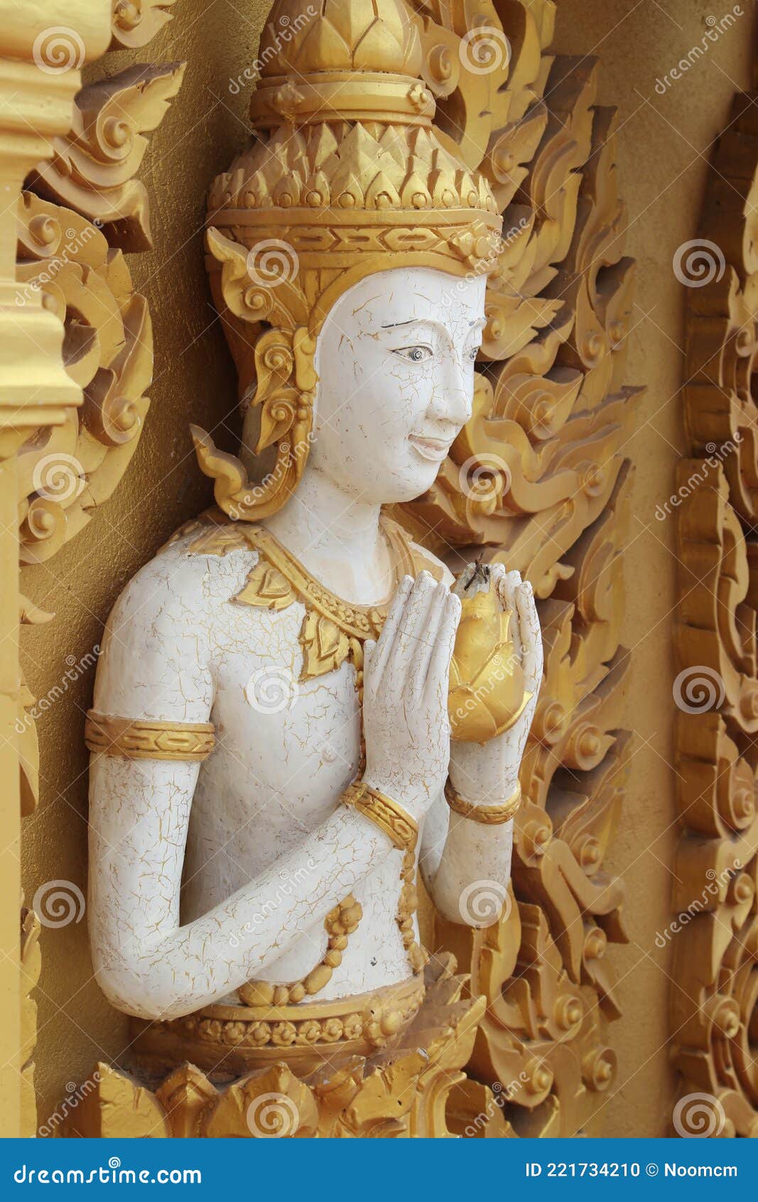 Deva statue in the temple stock photo. Image of traditional - 221734210