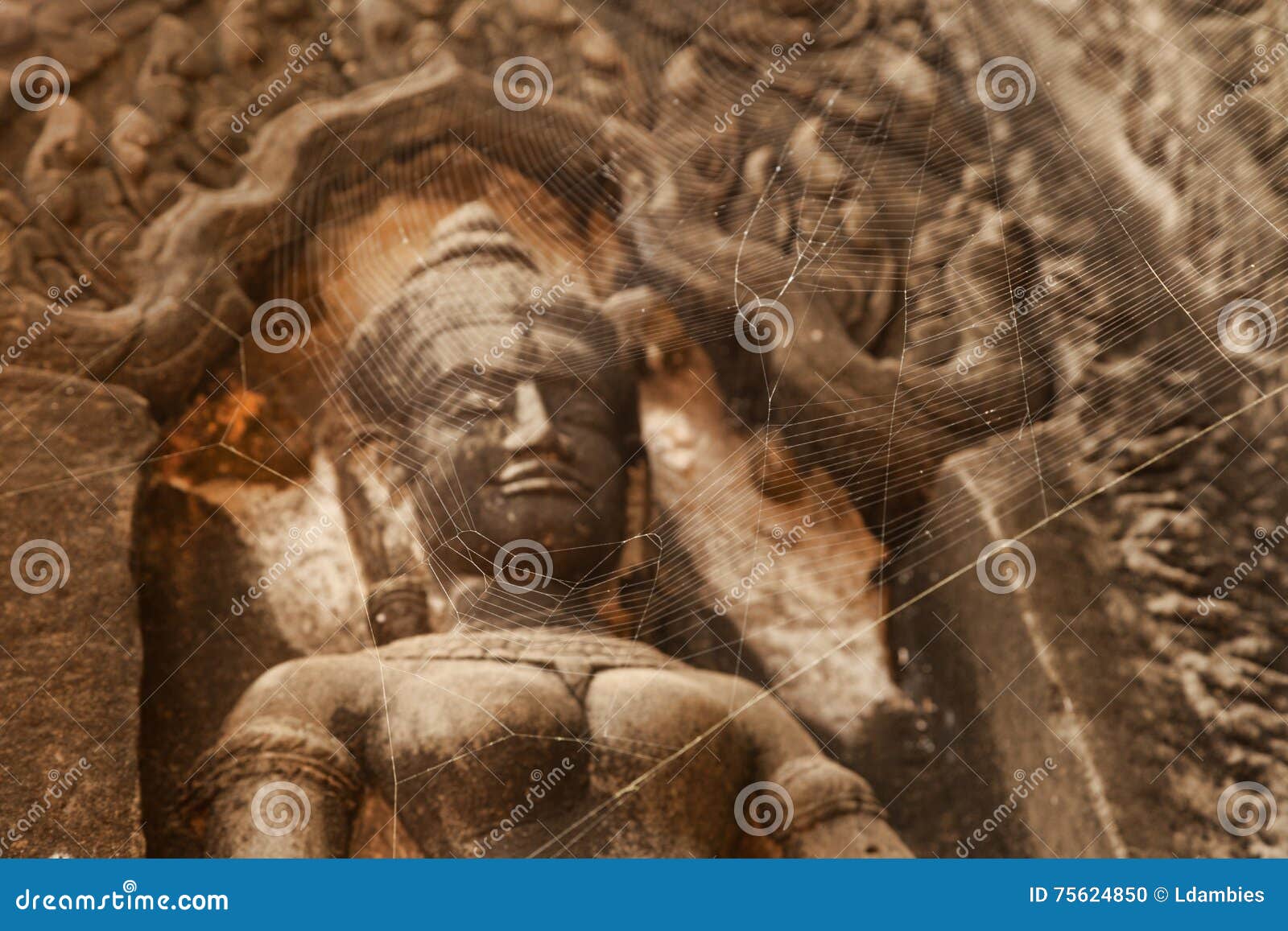 Devata statue in Ta Phrom stock photo. Image of buddhism - 75624850