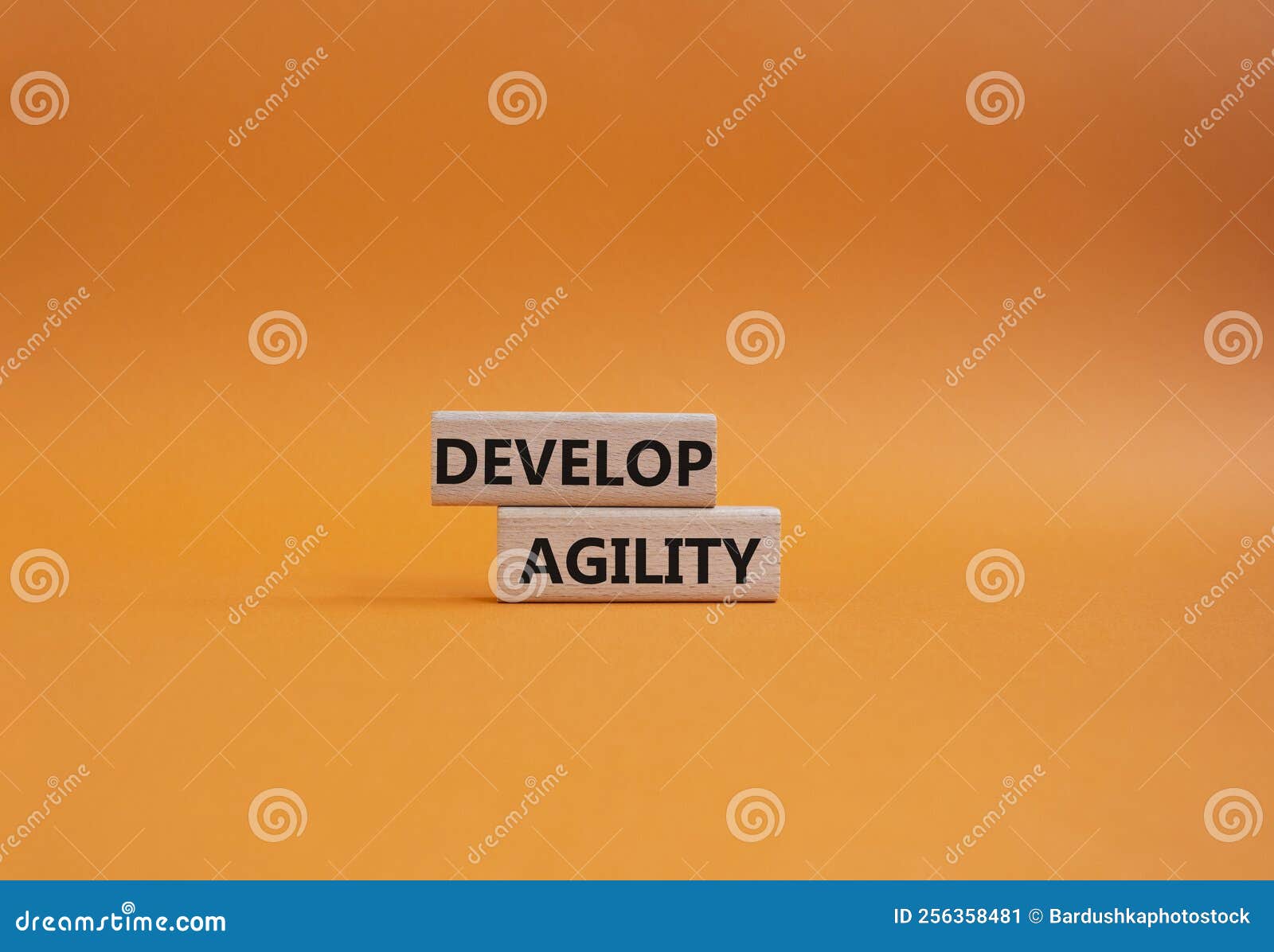 Develop Agility Symbol. Concept Word Develop Agility on Wooden Blocks ...