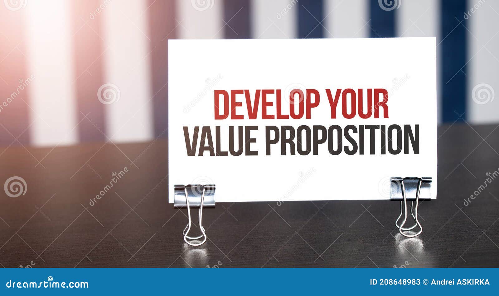 Develop Your Value Proposition Sign on Paper on Dark Desk in Sunlight ...