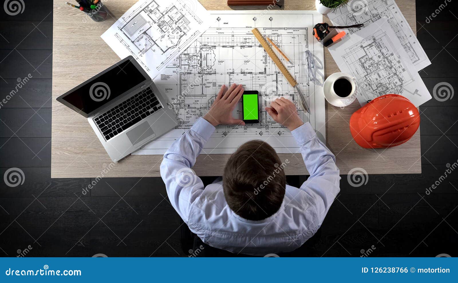 Developer Checking Information about House Construction on Green Screen ...