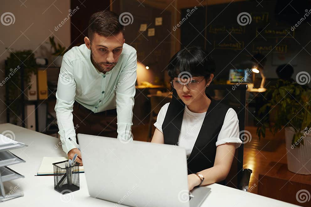 Developer Helping Coworker stock photo. Image of pitch - 322505106