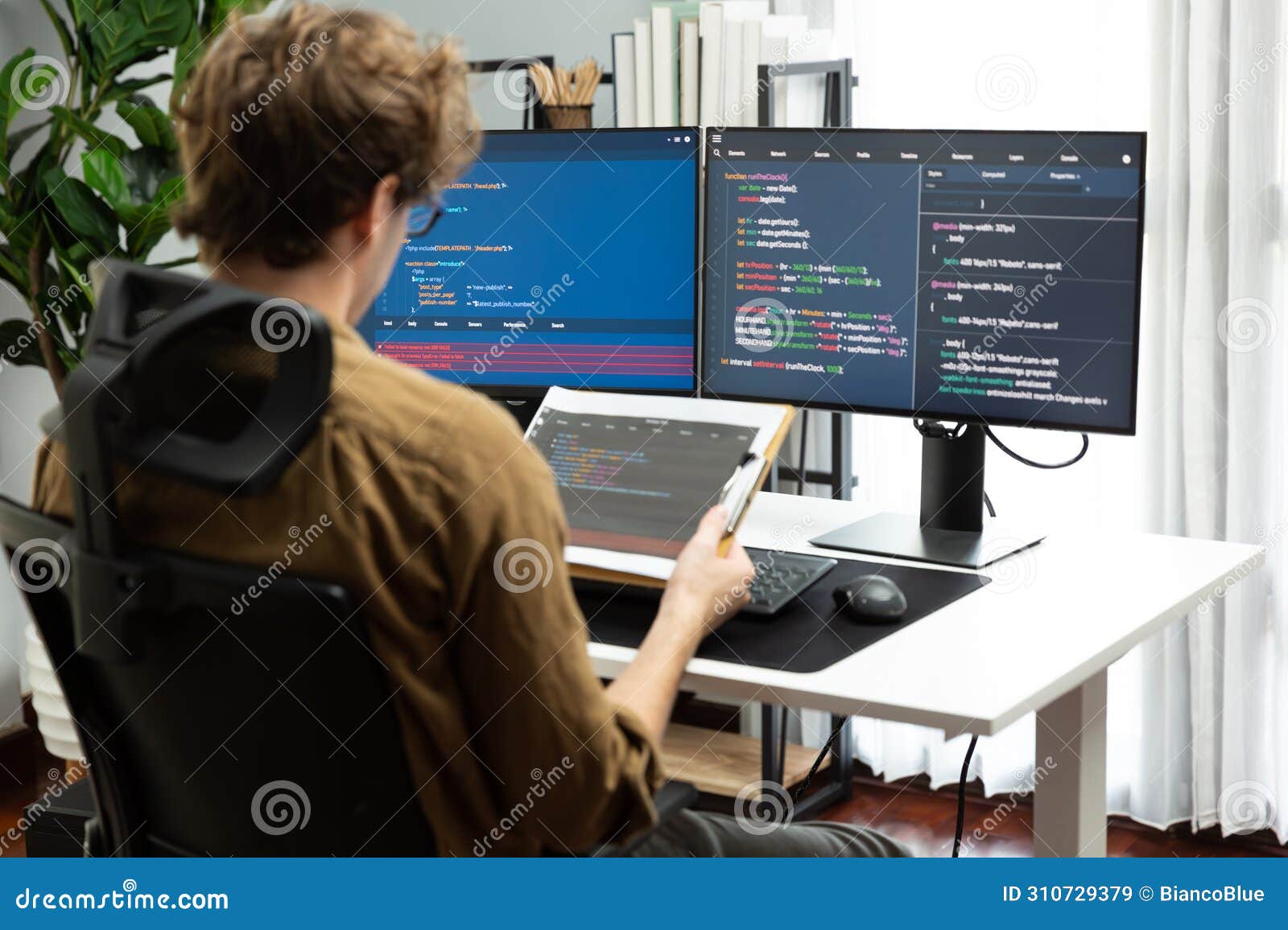 It Developer Reading Coding on Document Paper Software with Screens ...