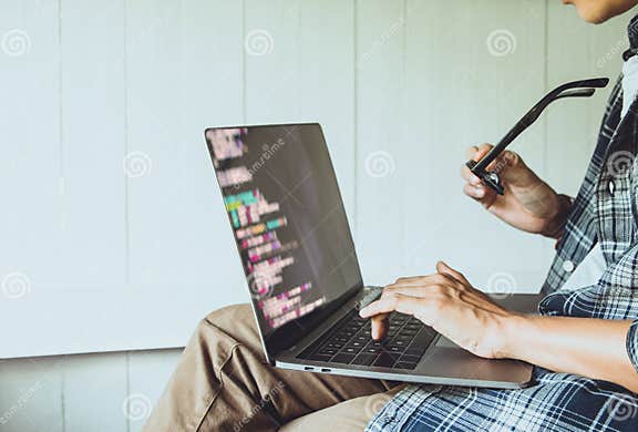 Developer Sitting On Chair Programming And Coding Technology Website Design Safety Of The Social