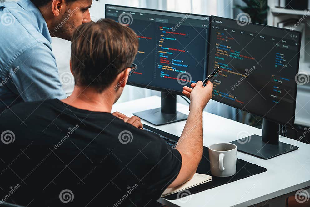 It Developers Discussing Online Software Development Information. Sellable. Stock Photo - Image ...