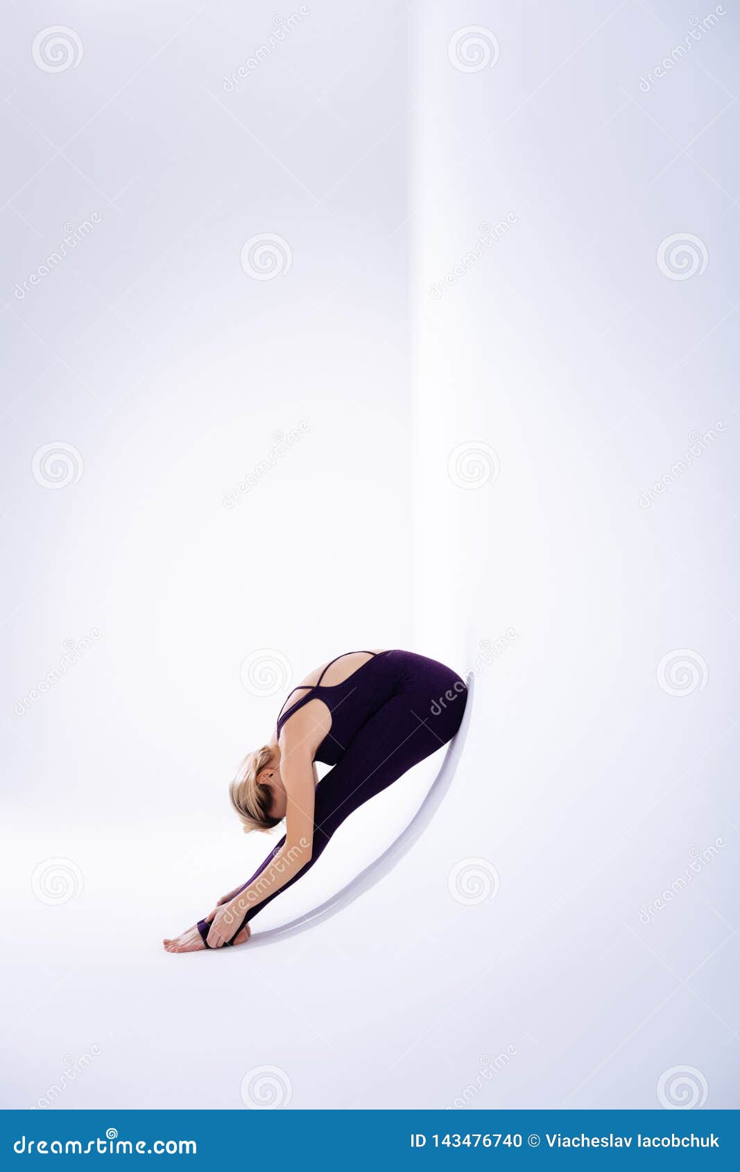Pleasant Flexible Good Looking Woman Leaning Forward Stock Photo ...
