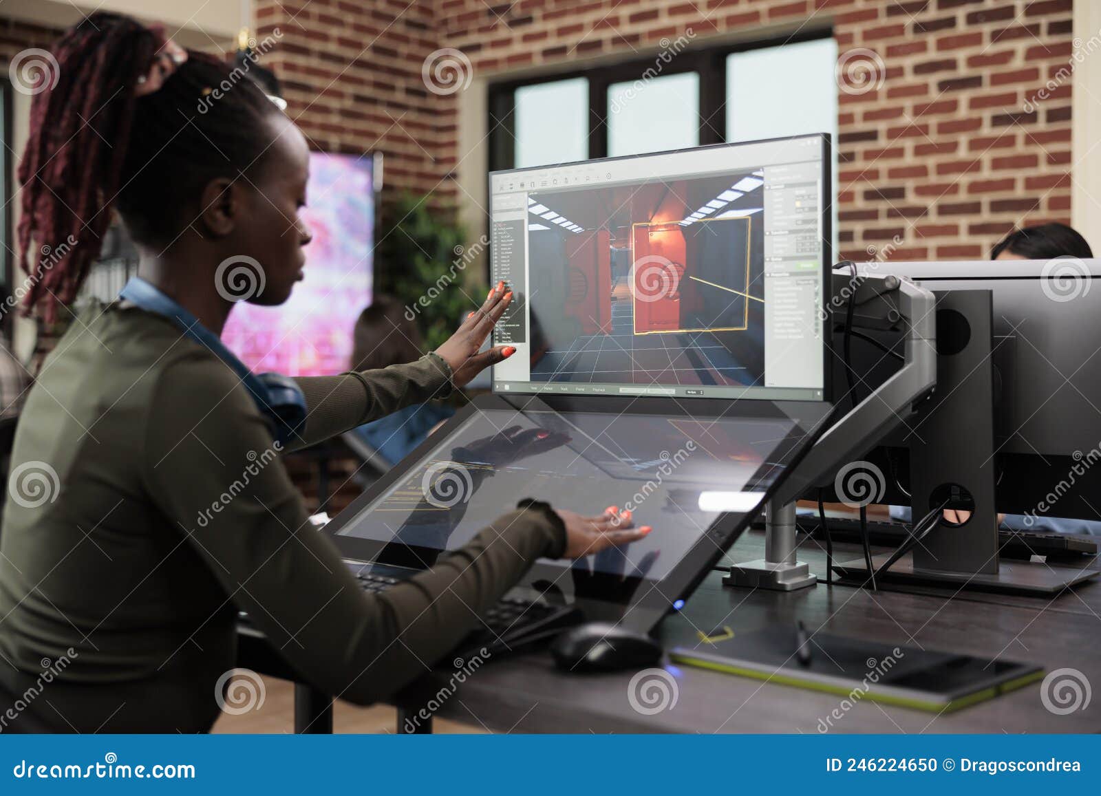 Developing Company Employee Working at Computer with Two Monitors while ...
