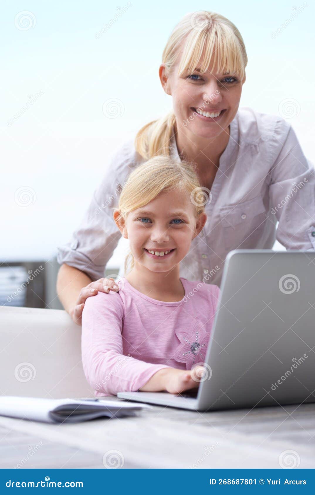 Developing Her Computer Skills. a Mother Teaching Her Daughter How To ...