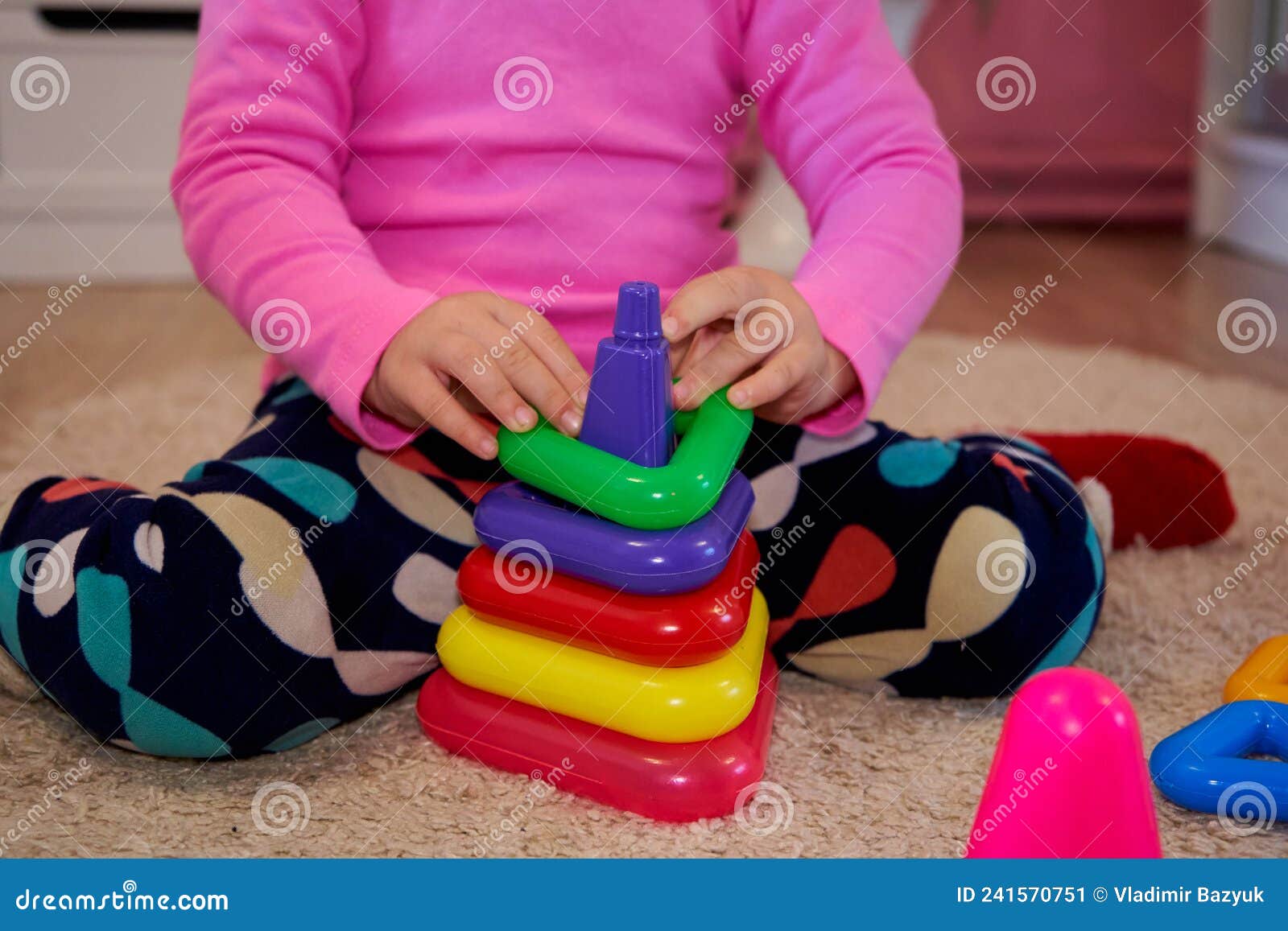Child is Playing a Toy Pyramid,development of Children To Think ...