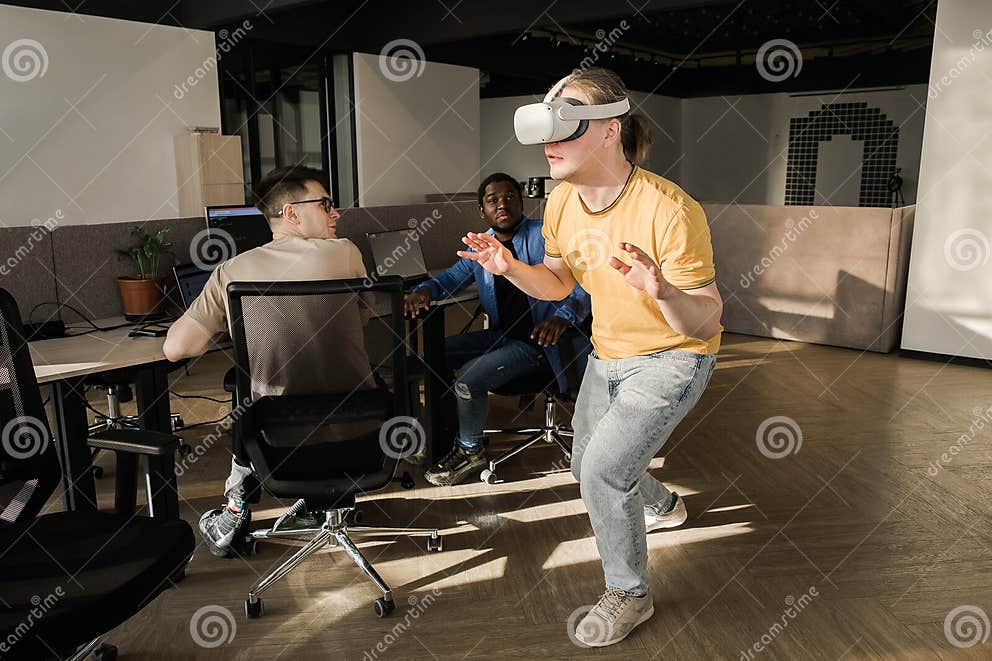 It Development Team Working on VR Project. Man Wearing VR Headset ...
