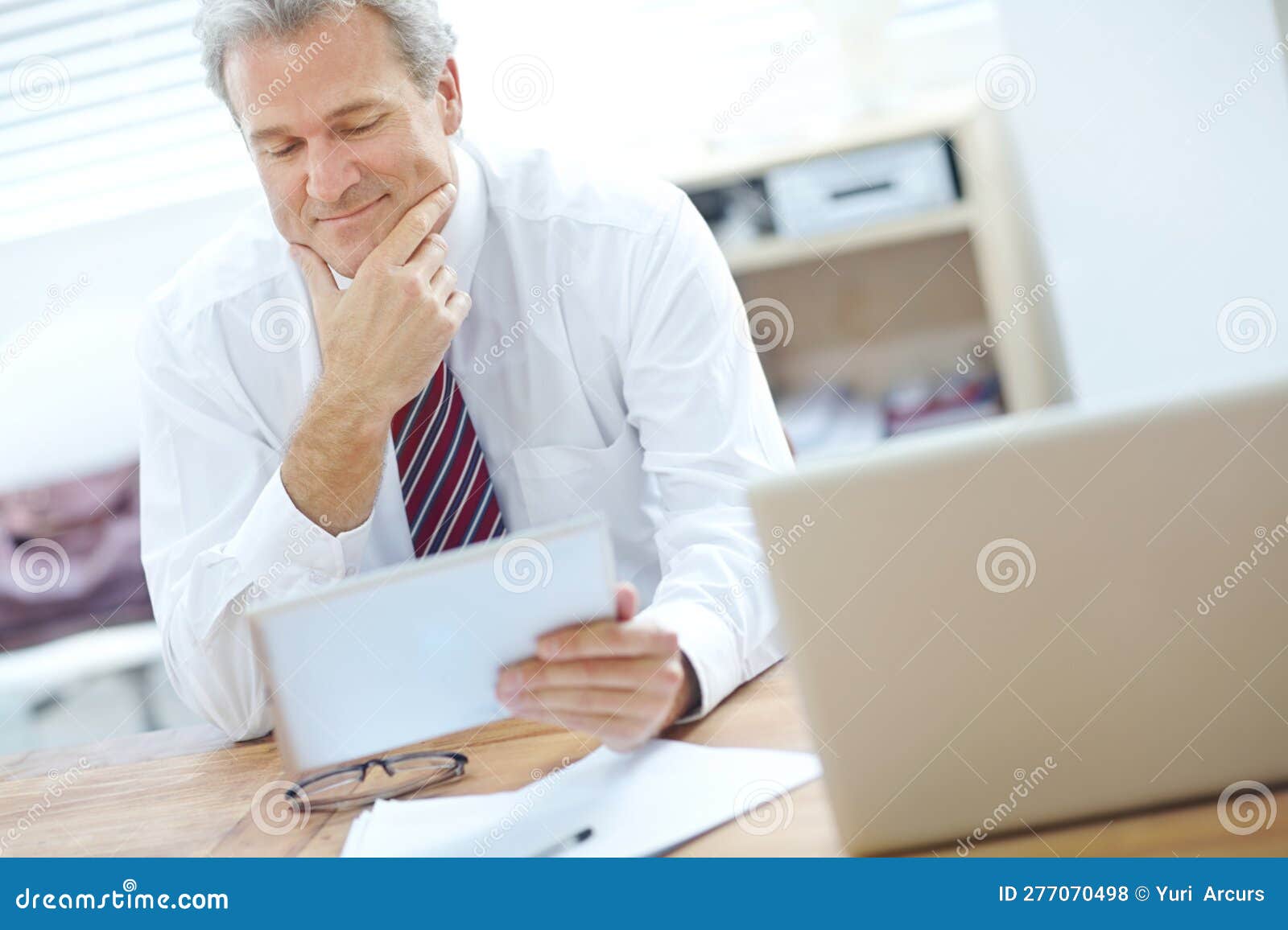 Developments Looking Promising. Attractive, Mature Businessman in the ...