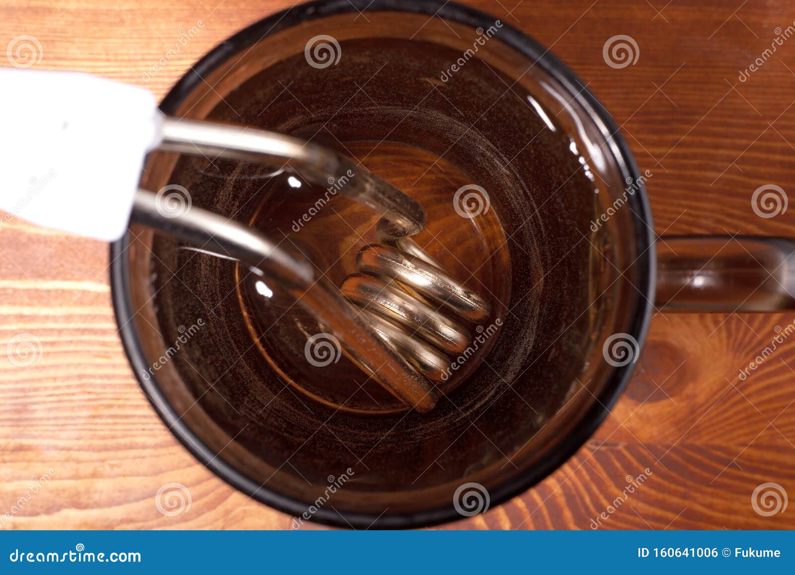 A Device for Heating Water Coil in a Mug Top View Stock Photo - Image ...