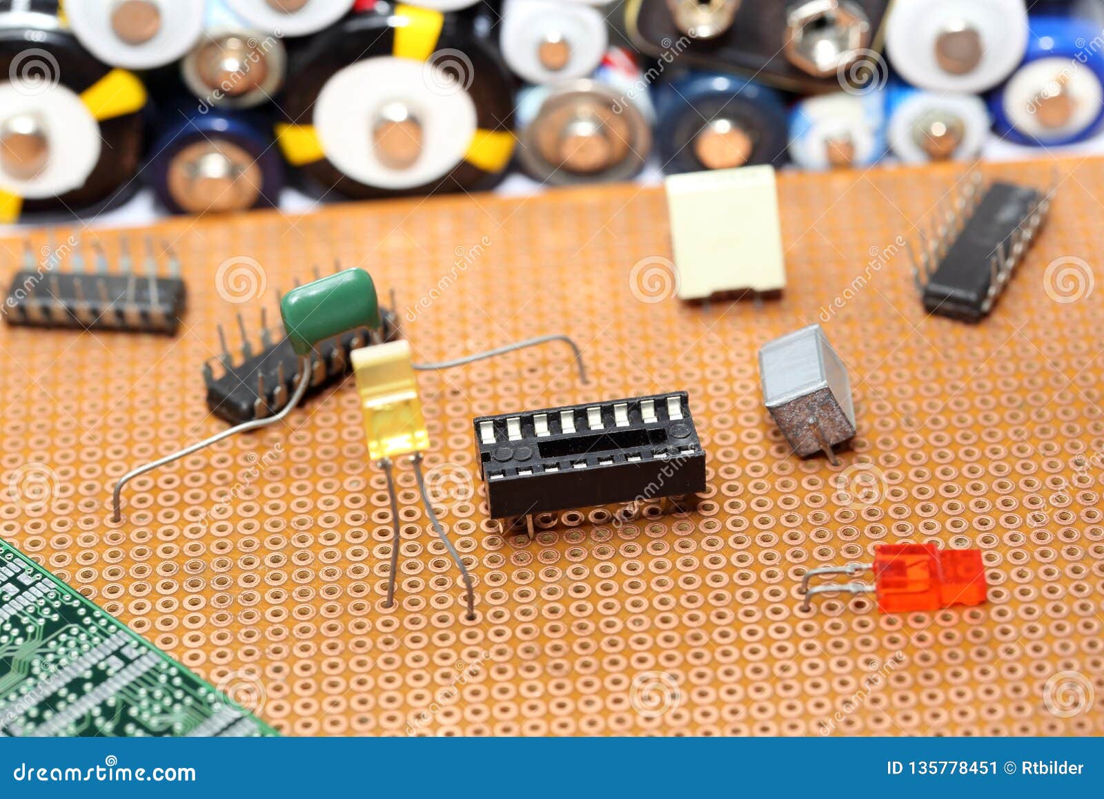 Devices on a circuit board stock image. Image of electronic - 135778451