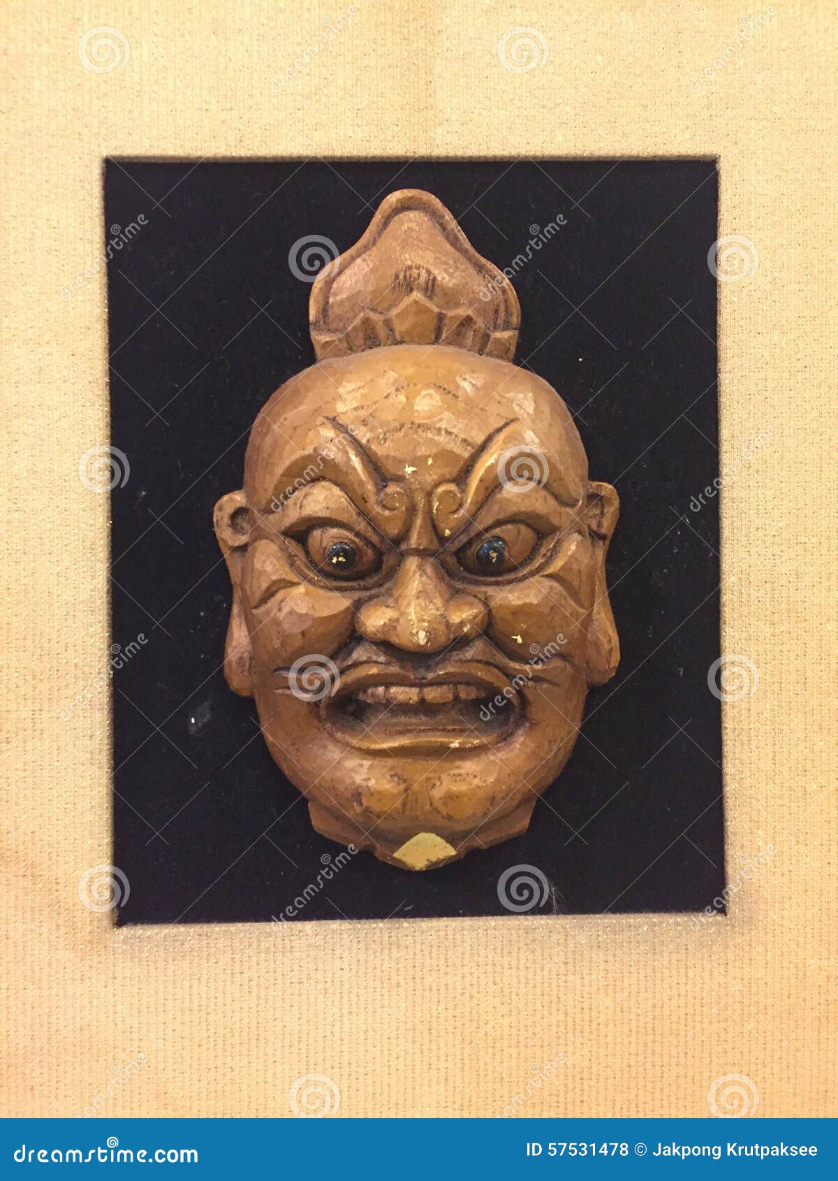 Devil mask statue on wall stock photo. Image of mask - 57531478