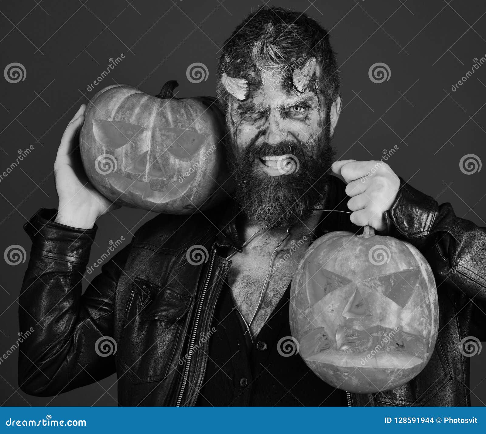 Devil or Monster with October Decorations. Man Wearing Scary Makeup ...