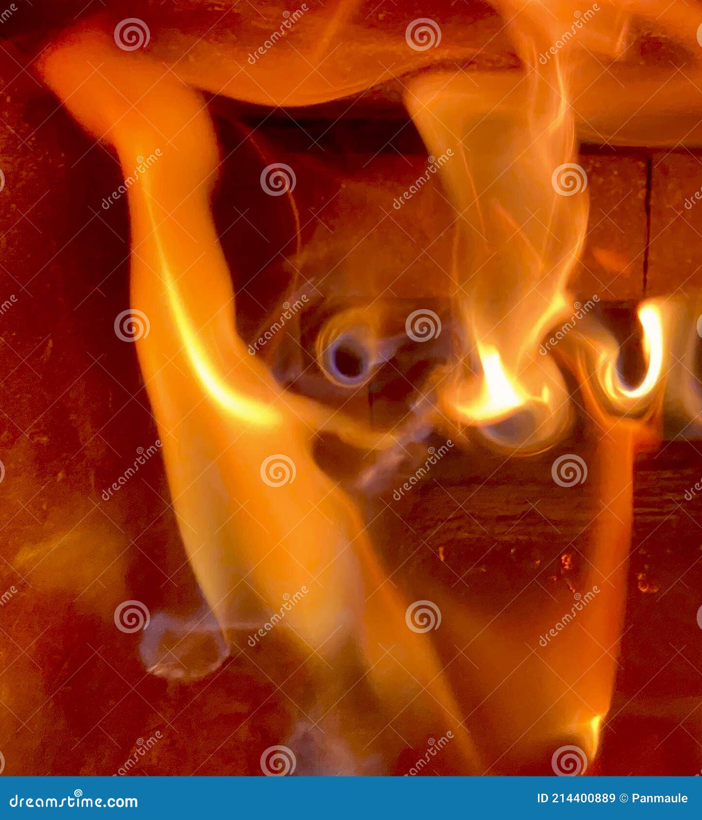Devil`s face in a log fire stock image. Image of heat - 214400889