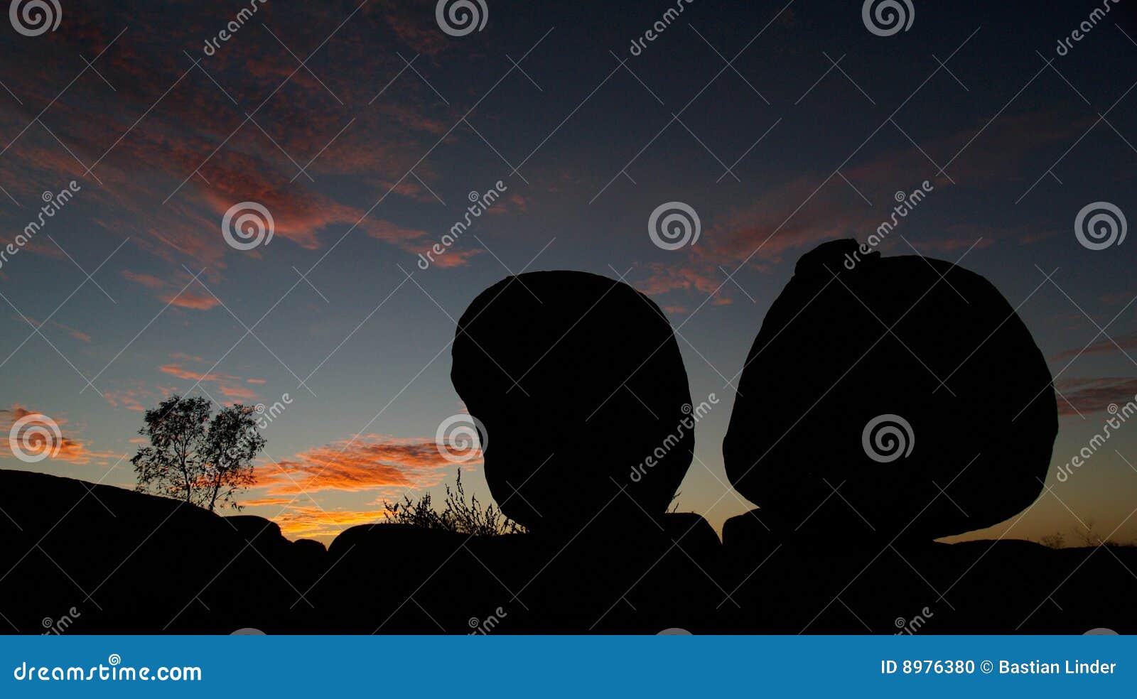 Devils Marbles Sunset stock photo. Image of tree, eroded - 8976380