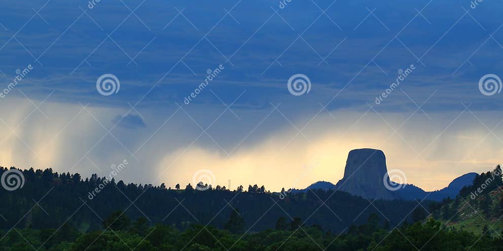 Devils Tower National Monument Stock Image - Image of evening, cumulus ...