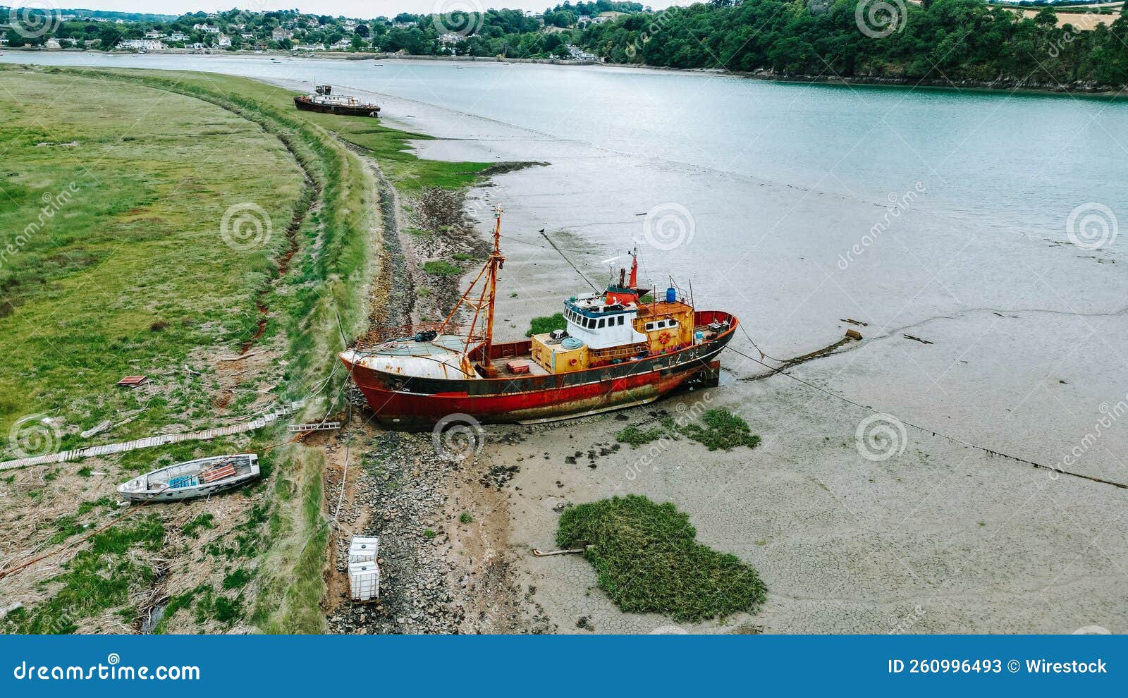 Devon Beach with Waterfall, Boats, Sea and Cliffs Editorial Stock Photo ...