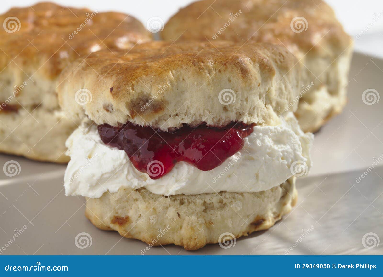 Devonshire Scone with Cream and Jam Stock Photo - Image of scones ...