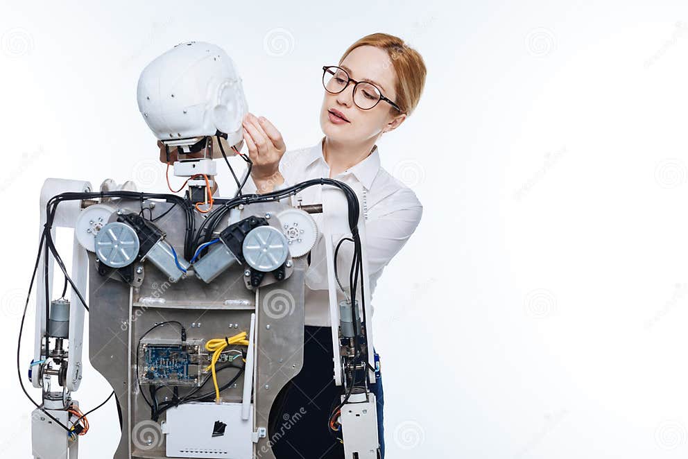 Devoted Precise Woman Making Sure the Robot Working Right Stock Image ...