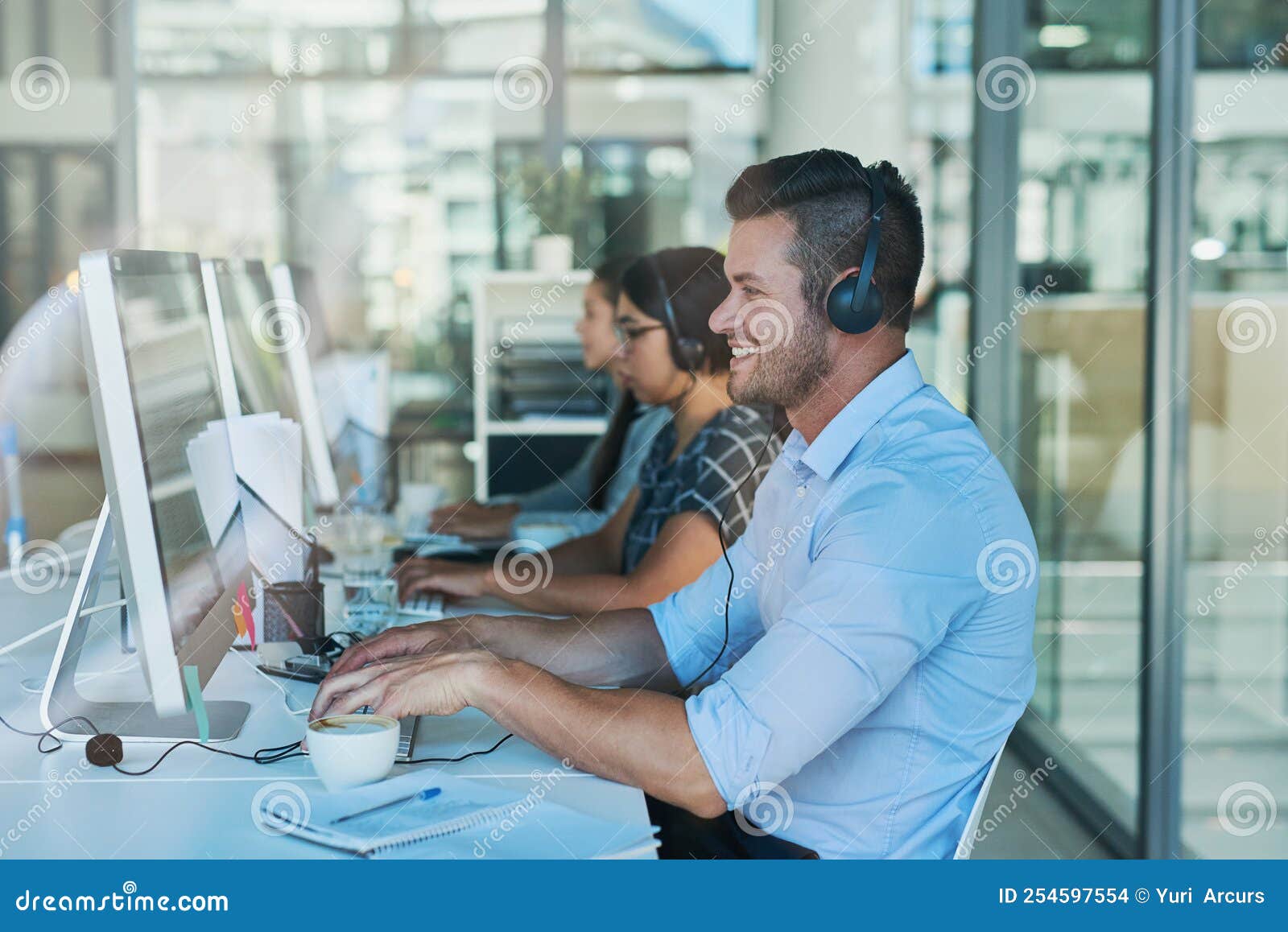Devoting Their Undivided Attention To Your Call. a Team of Call Center ...