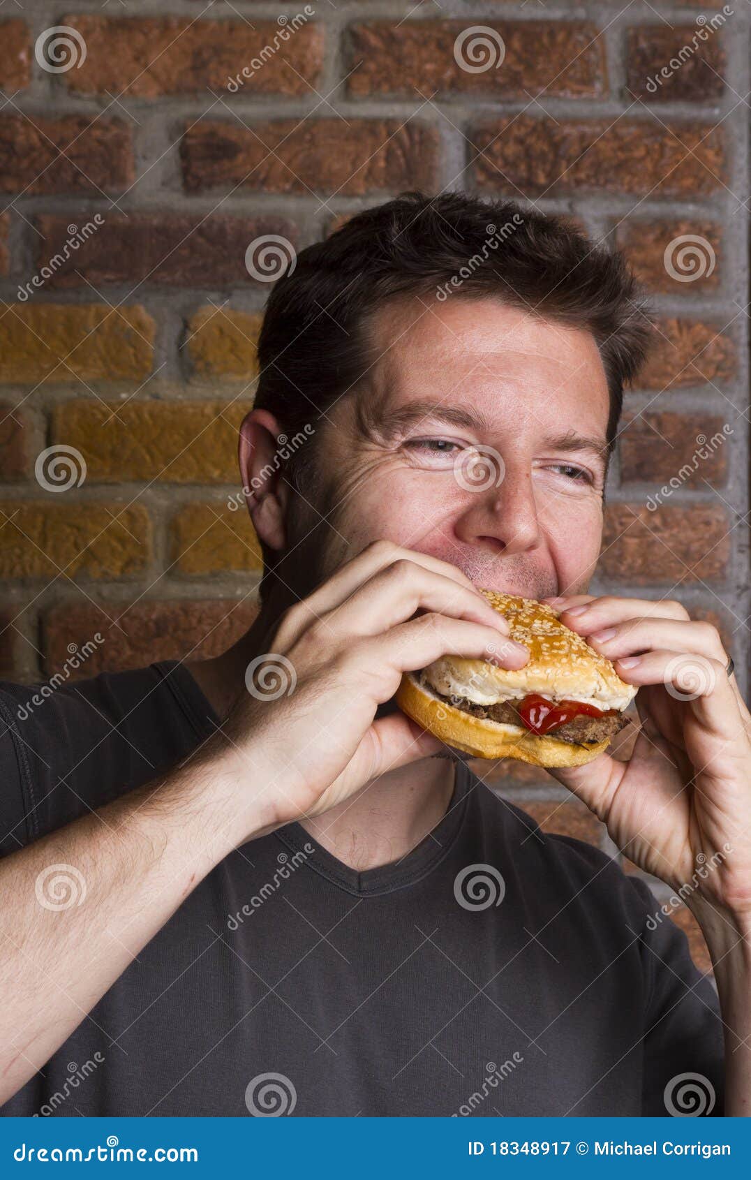 Devouring a Hamburger for Lunch Stock Image - Image of build, white ...