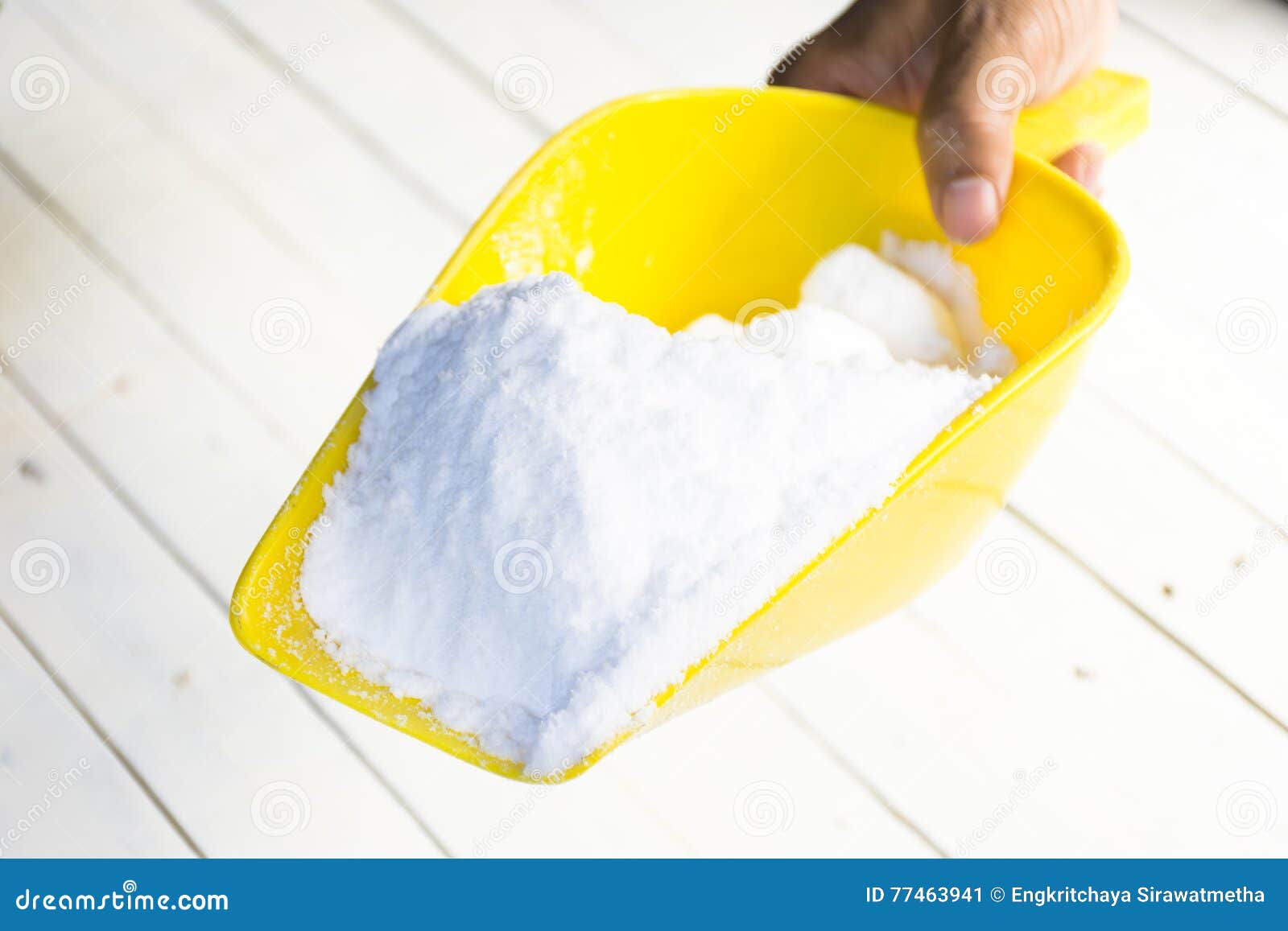 Dextrose in Yellow Shovel in Hand on Wooden White Table. Stock Image ...