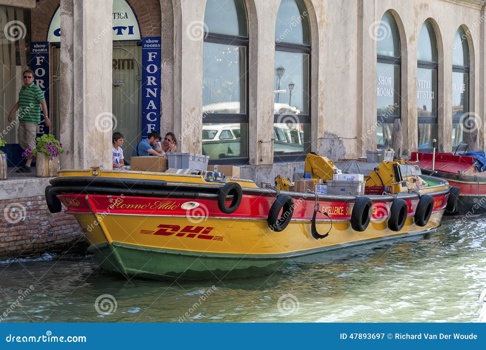 DHL Cargo boat Venice editorial photography. Image of postman - 47893697