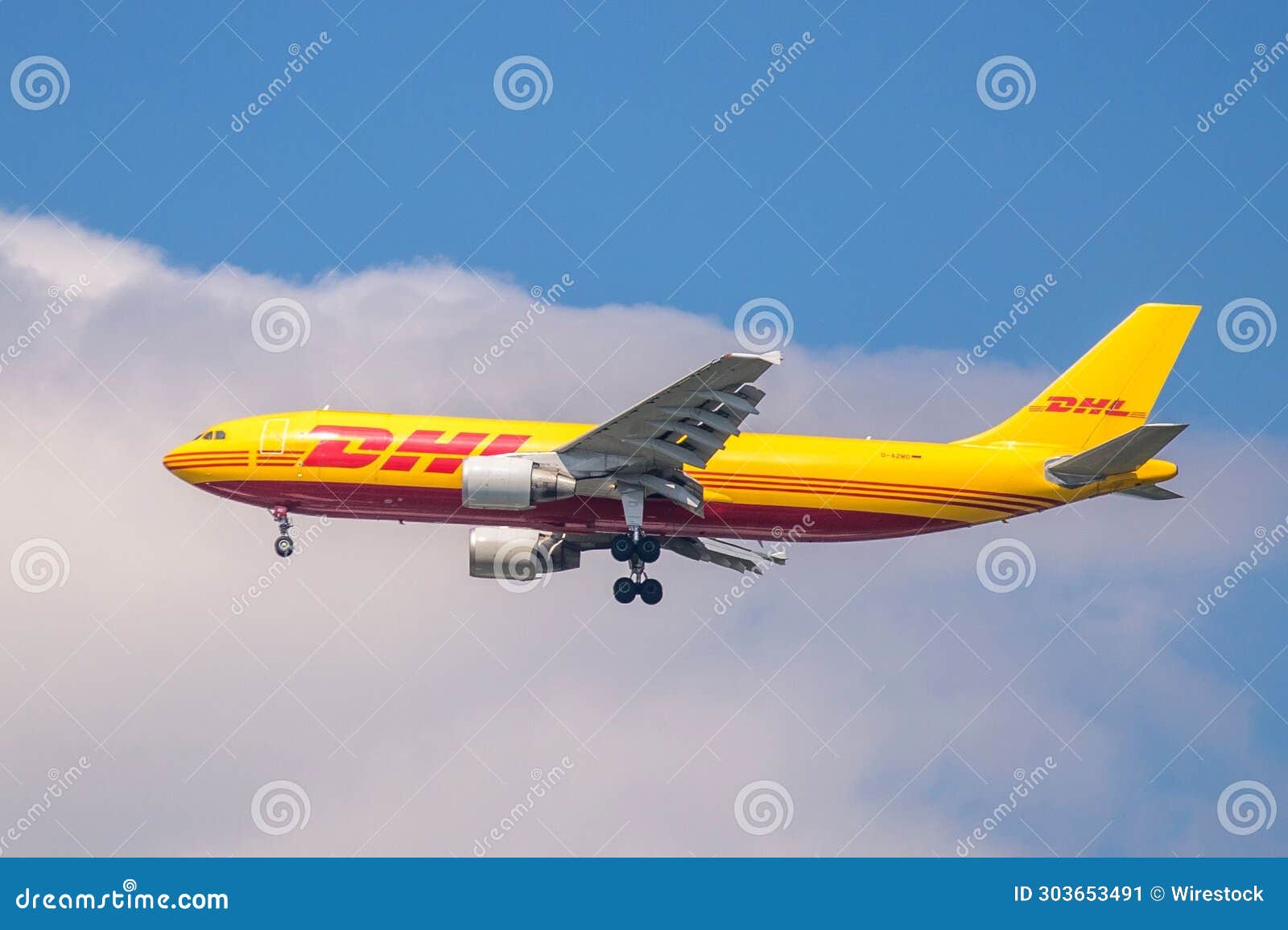 DHL Cargo Plane Flying High in the Blue Sky Editorial Photo - Image of ...
