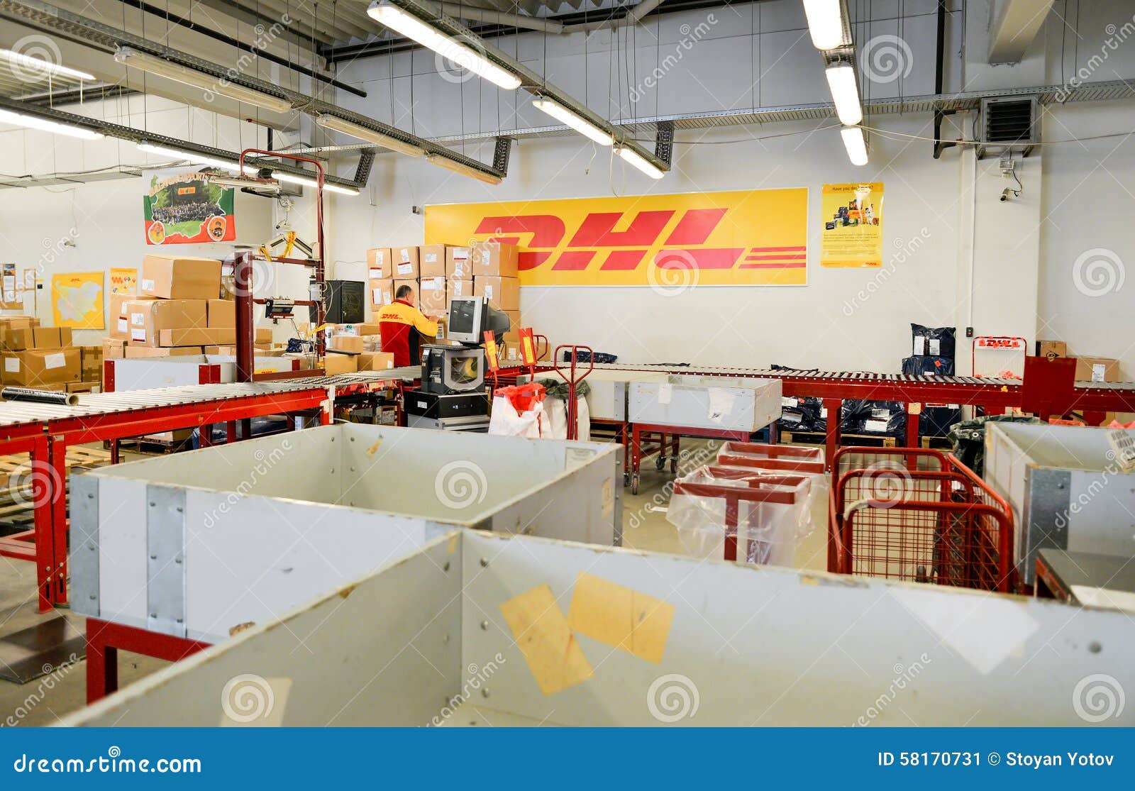 DHL Delivery Worker Cheking Package Boxes Editorial Photo - Image of ...