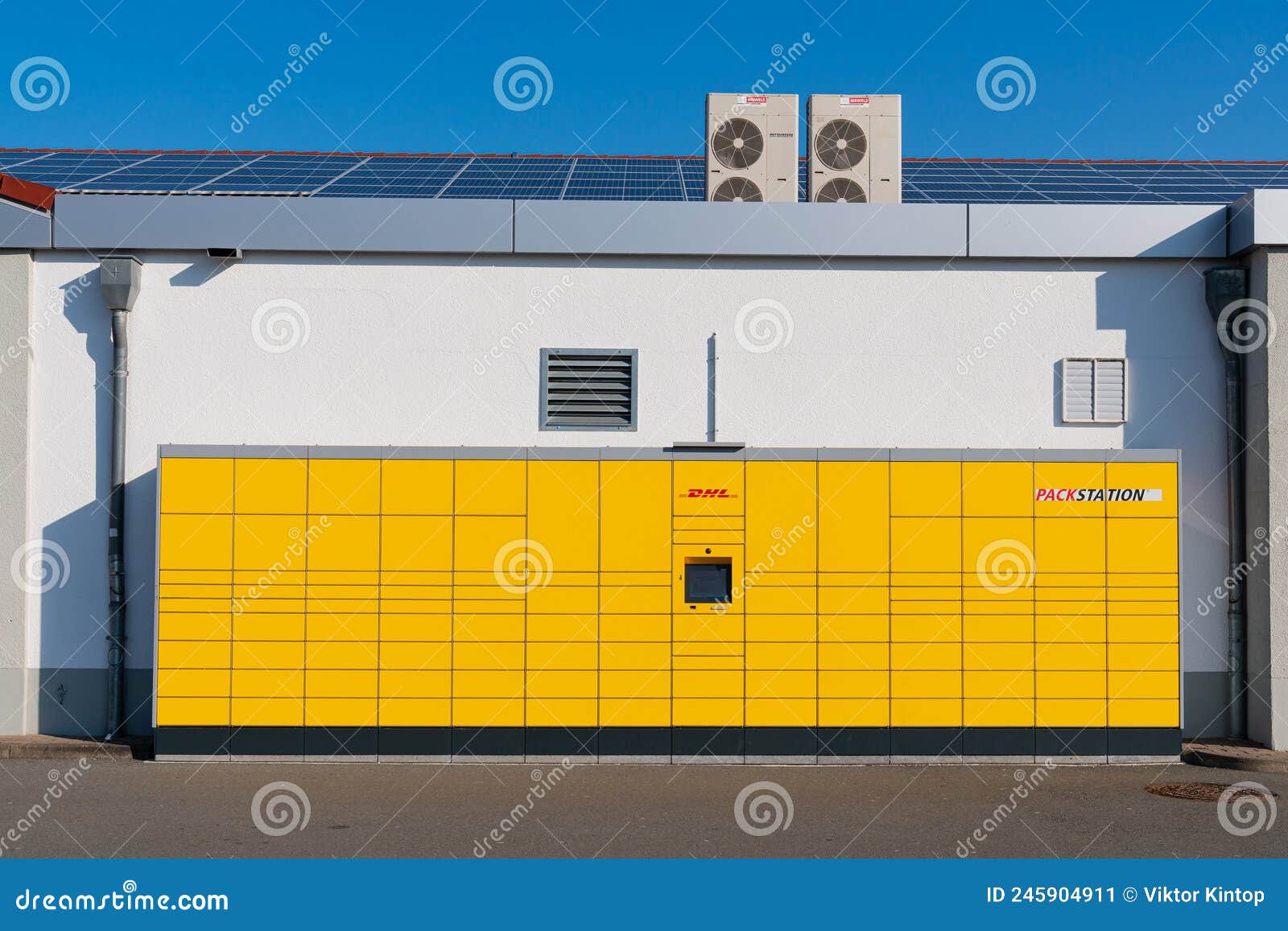 DHL Packstation on the White Wall. Paderborn, Germany, March 23, 2022 ...