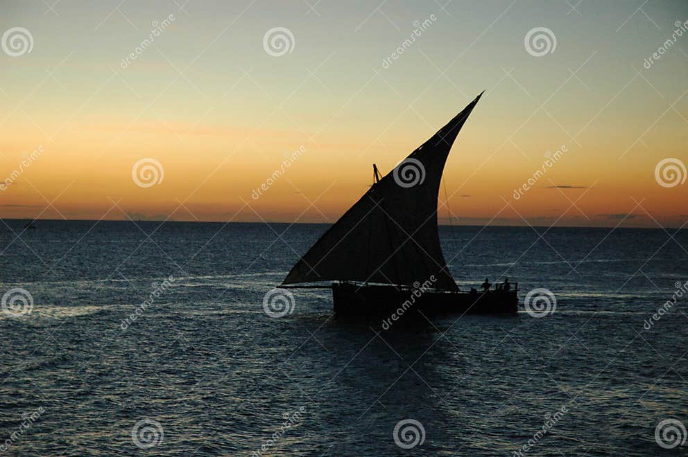 Dhow at sunset stock photo. Image of sail, silhouette - 9183966