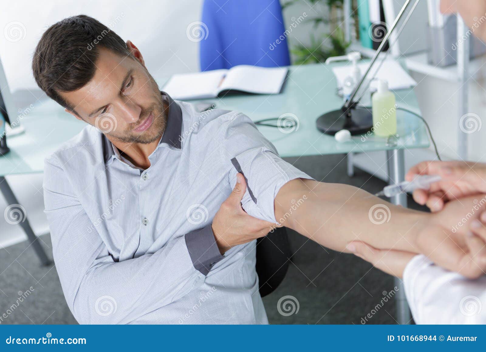 Diabetic Man Receiving Injection in Arm Stock Photo - Image of care ...