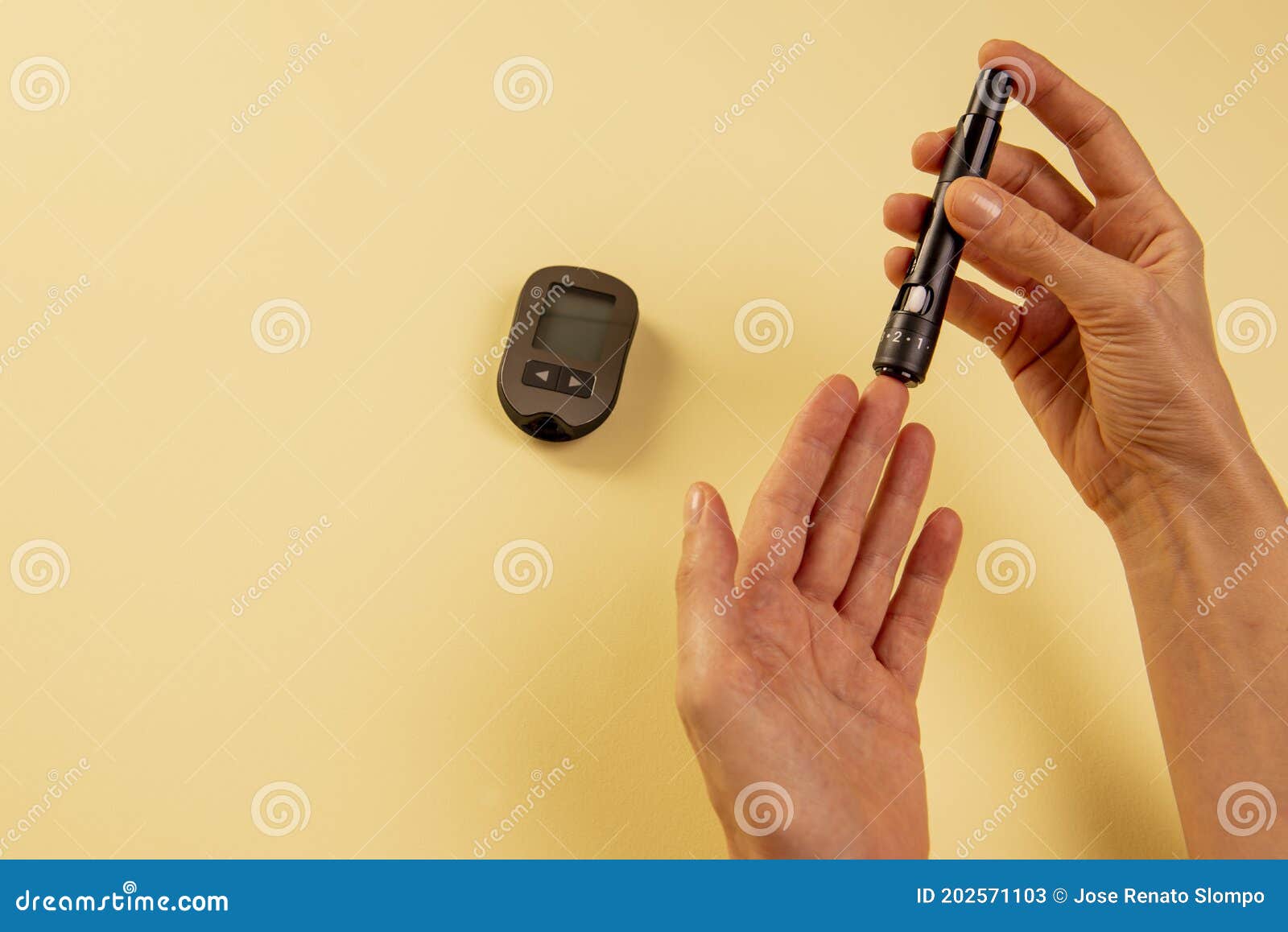 Diabetic Patient Checking Blood Glucose Level Using Glucometer Stock ...