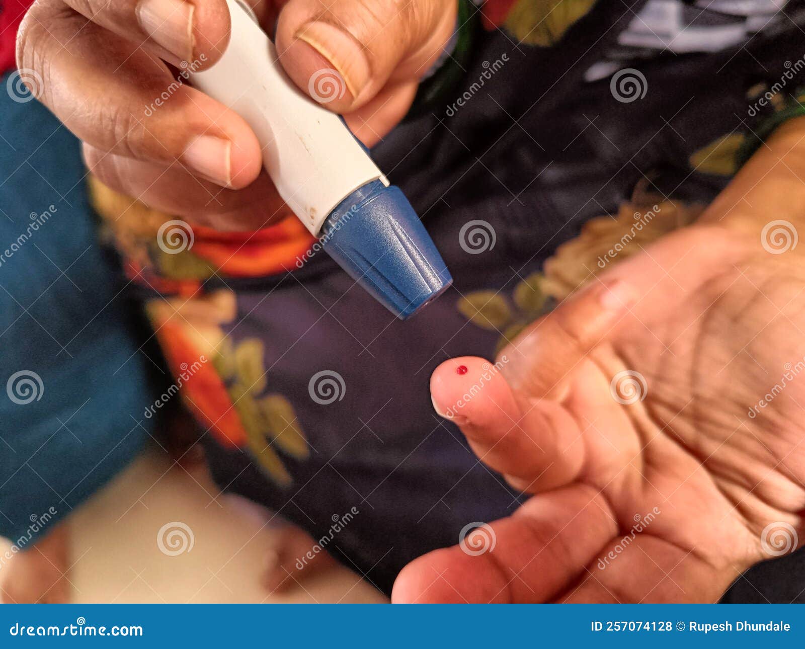 Diabetic Patient Checking Sugar Level by Machine Stock Photo - Image of ...