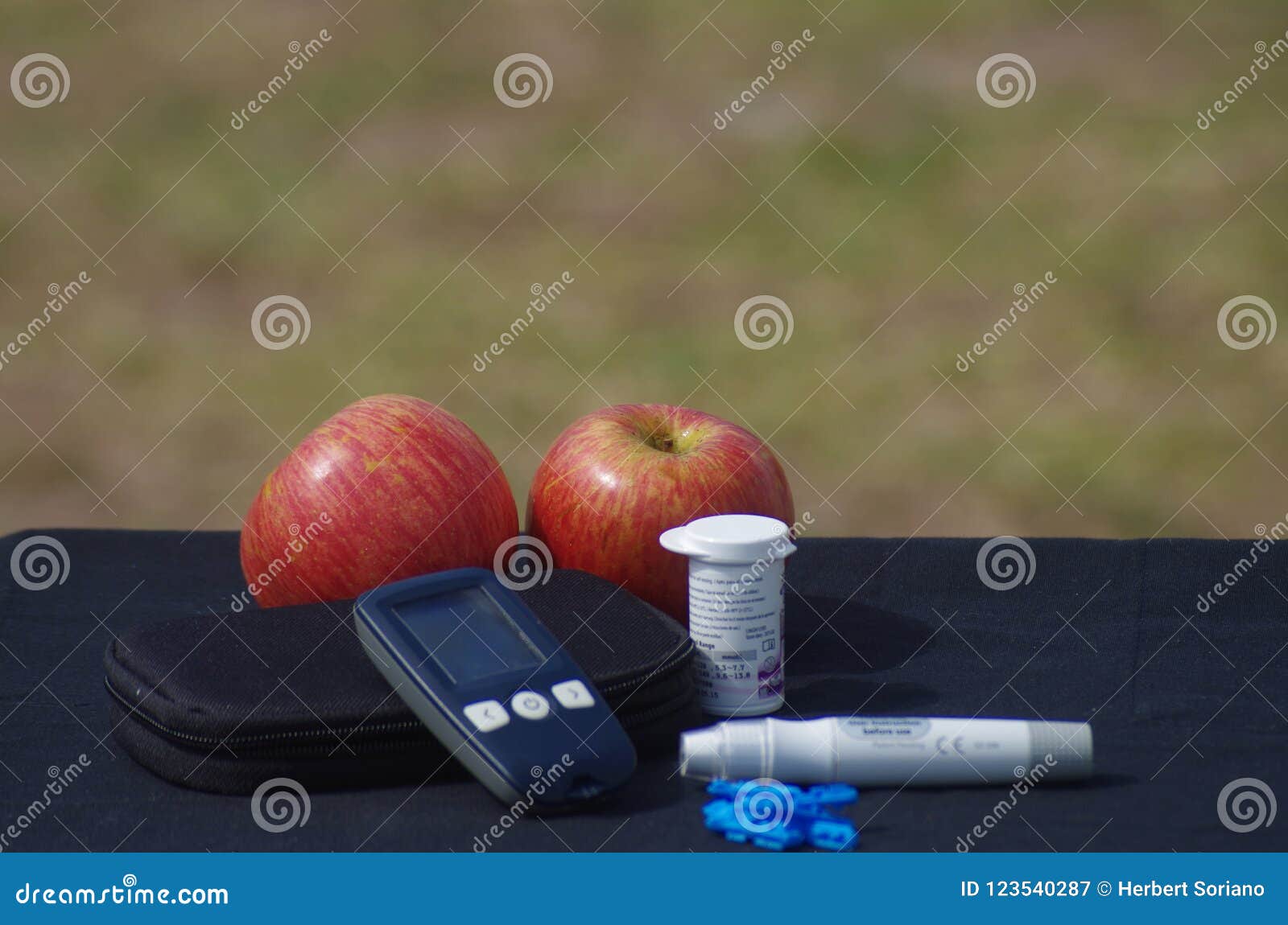 Diabetic Set Up Glucometer and Apple on a Table Stock Image - Image of ...