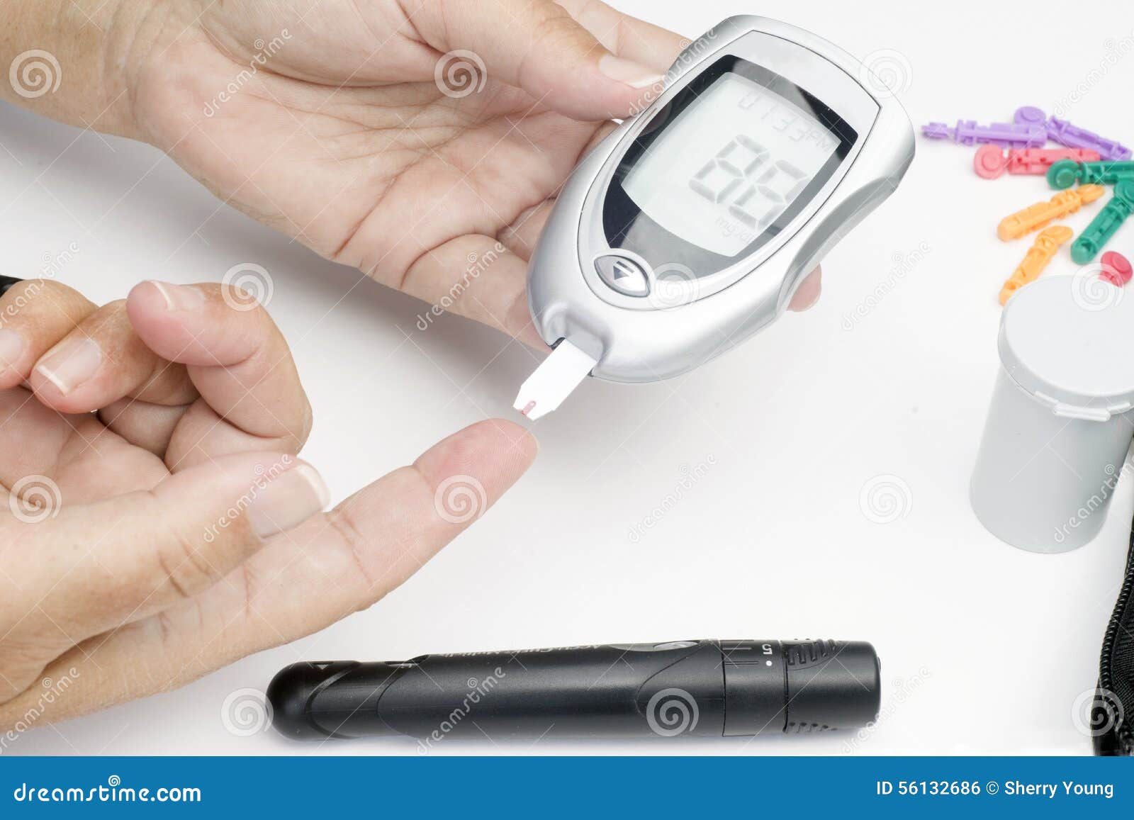 Diabetic Testing stock photo. Image of glaucometer, lancet - 56132686