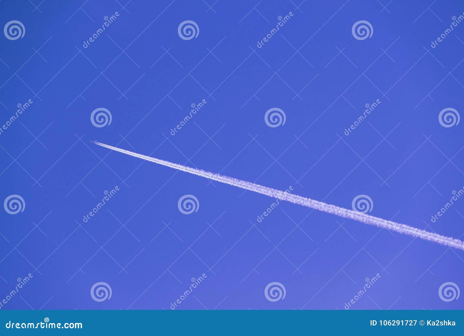 Diagonal Airplane Trace on a Clear Blue Sky. Stock Image - Image of ...