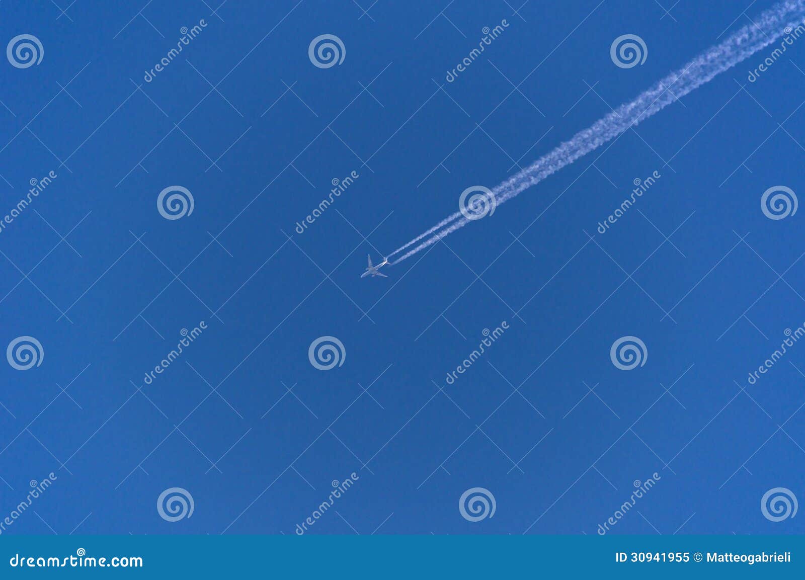 Diagonal Airplane Trace on a Clear Blue Sky Stock Image - Image of line ...
