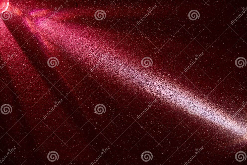Diagonal Diffused Gradient Pink Beam of Light on a Dark Red Structural ...