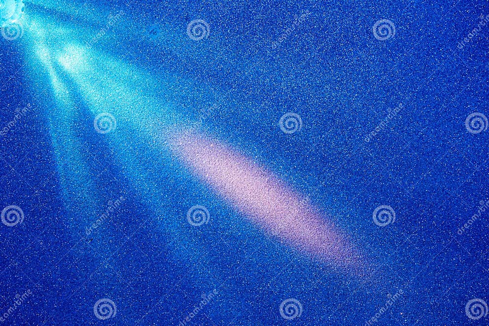 Diagonal Diffused Light Blue and Pink Beam of Light on a Blue ...