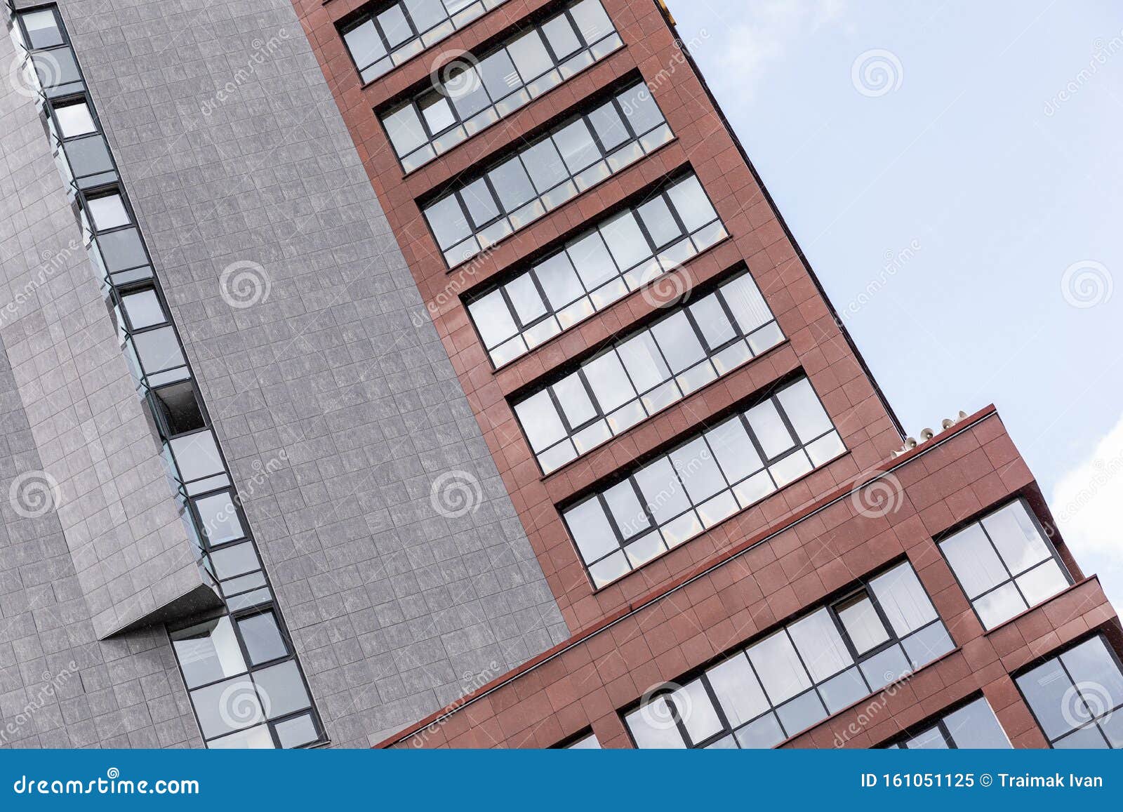 Diagonal Ground View of Sky Reflection in Windows of High Building ...