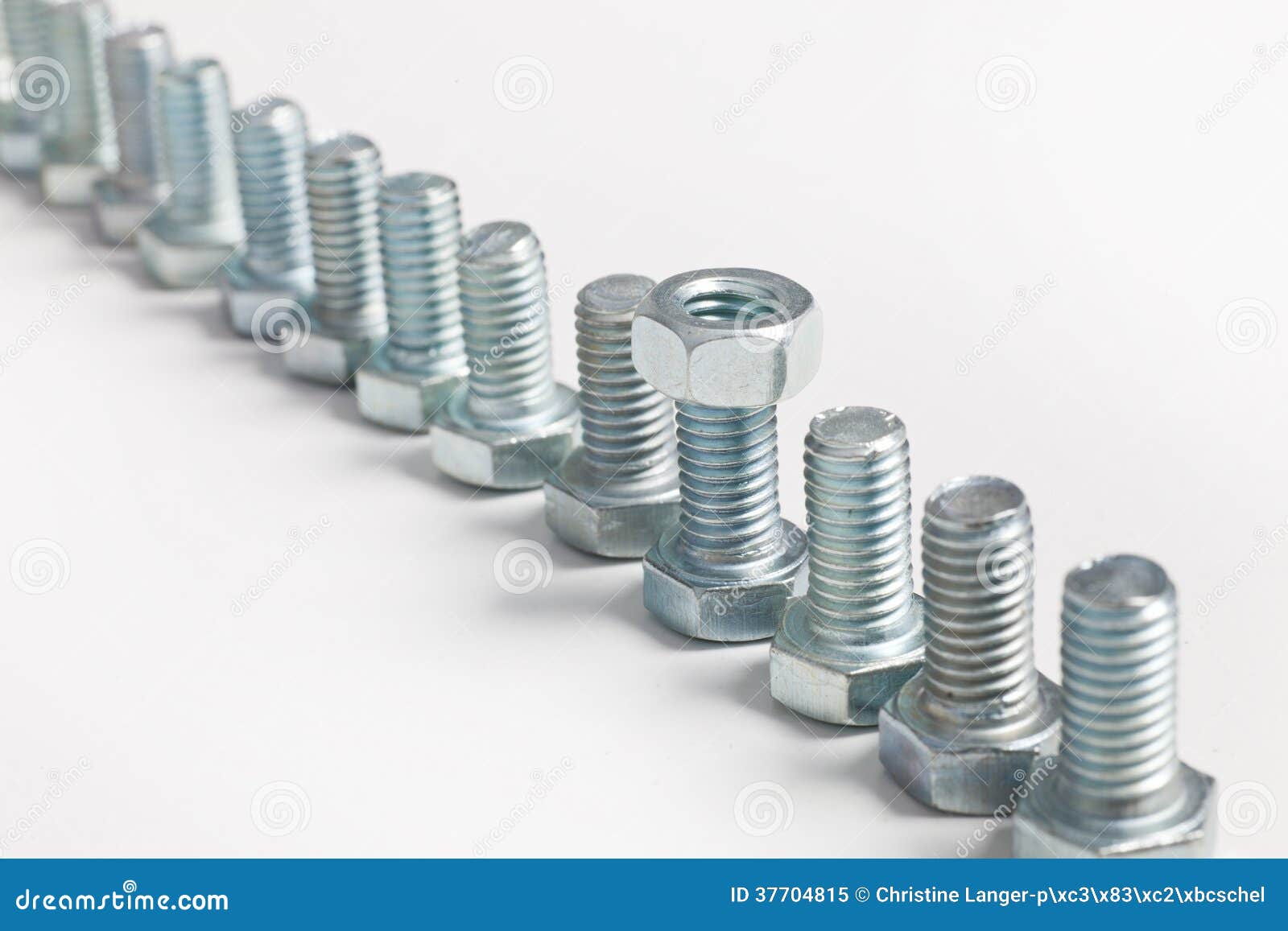 Diagonal Row of Bolts with a Single Nut Stock Image - Image of bolts ...