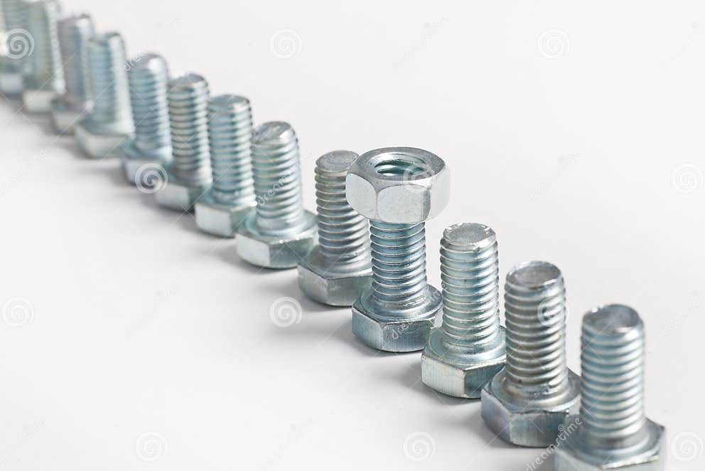 Diagonal Row of Bolts with a Single Nut Stock Image - Image of bolts ...