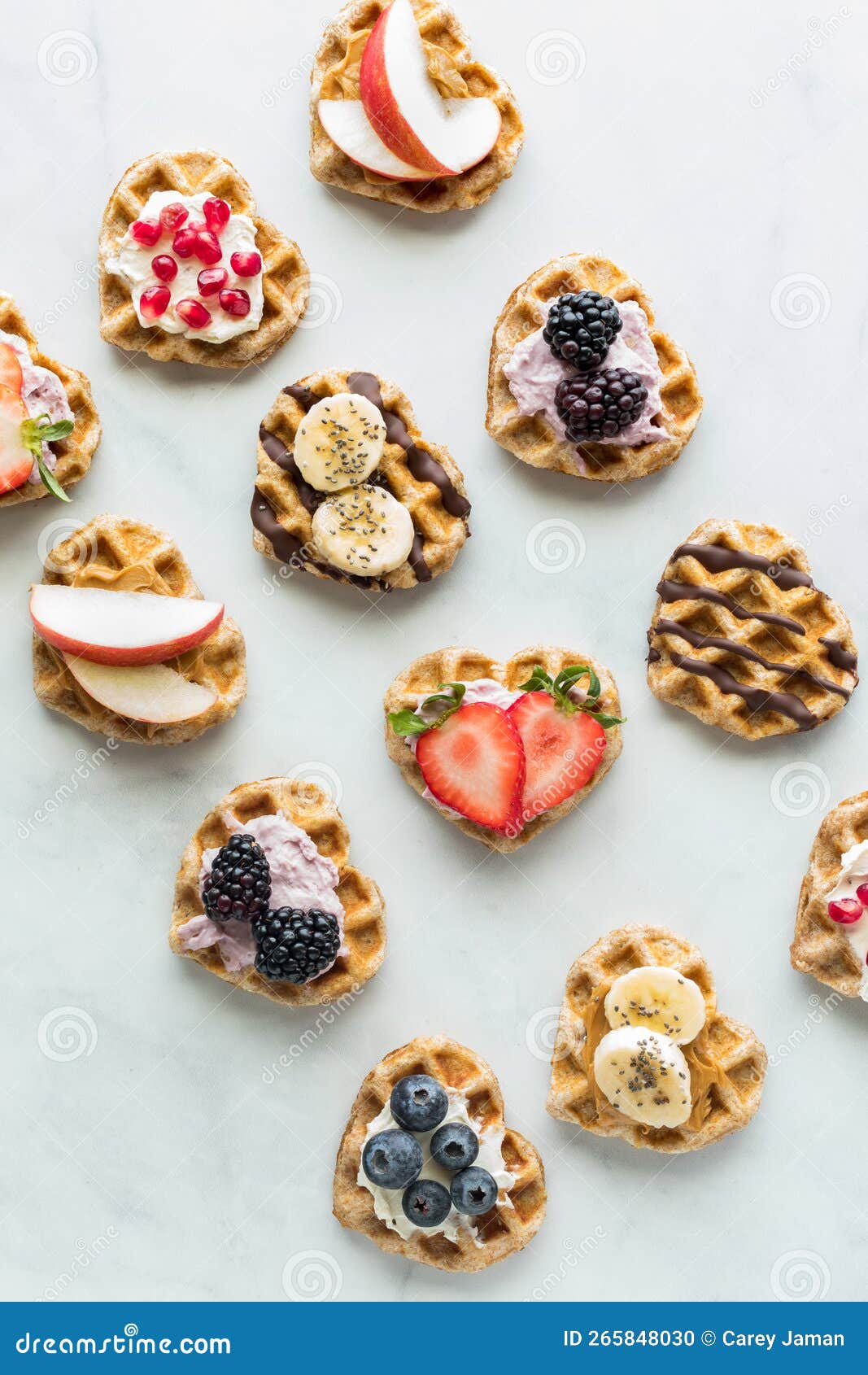 Diagonal Rows of Mini Heart Shaped Waffles with Various Toppings. Stock ...