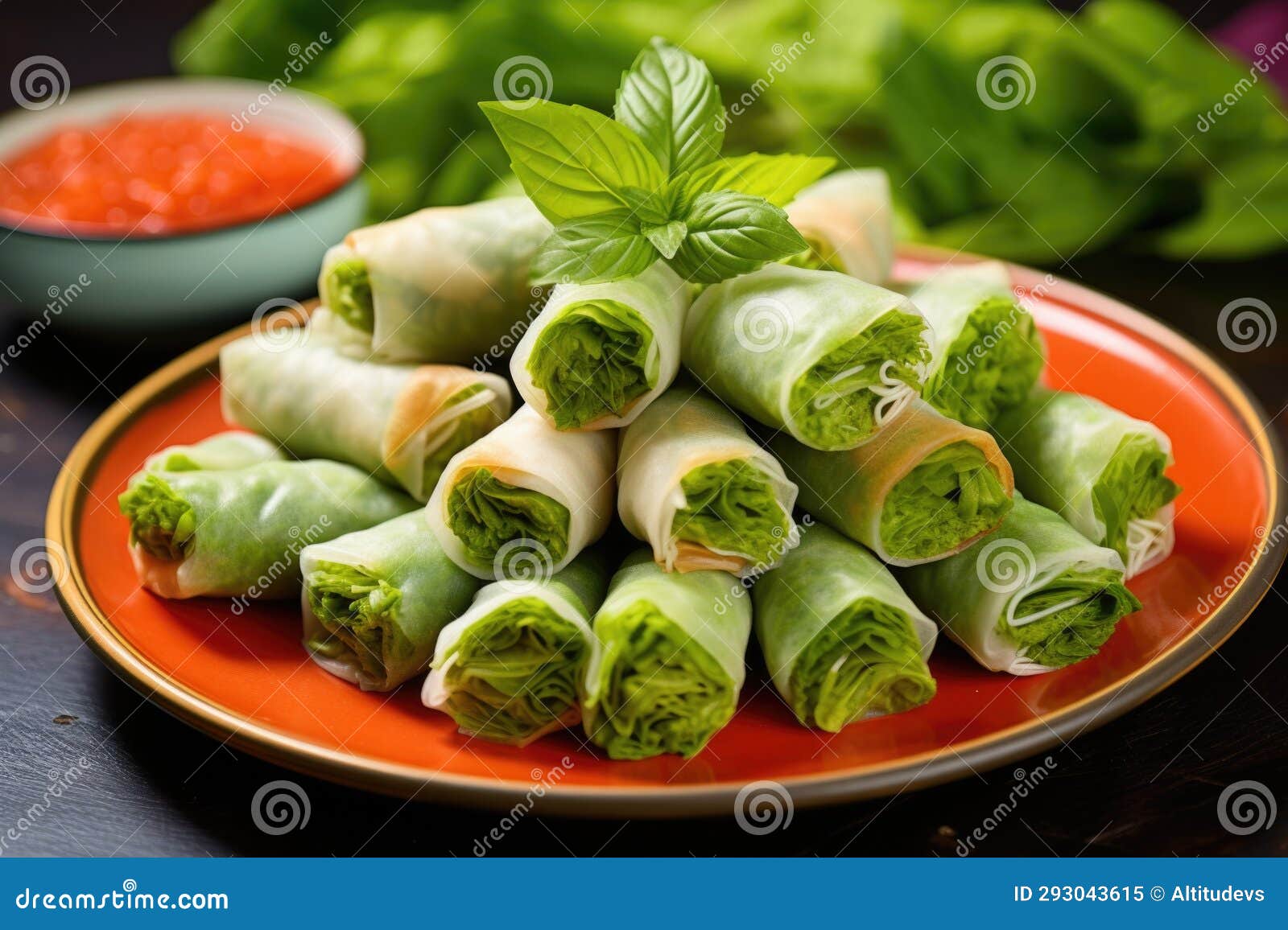A Diagonal Shot of a Pile of Spring Rolls on a Vibrant Green Plate ...