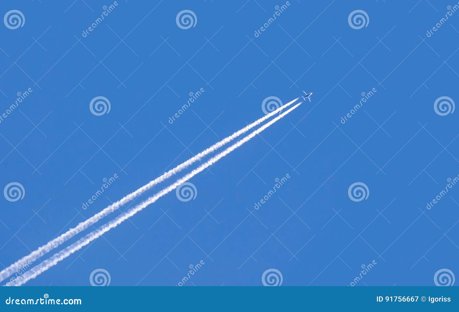 Diagonal Trace of Plane Flying in Blue Sky Stock Image - Image of ...