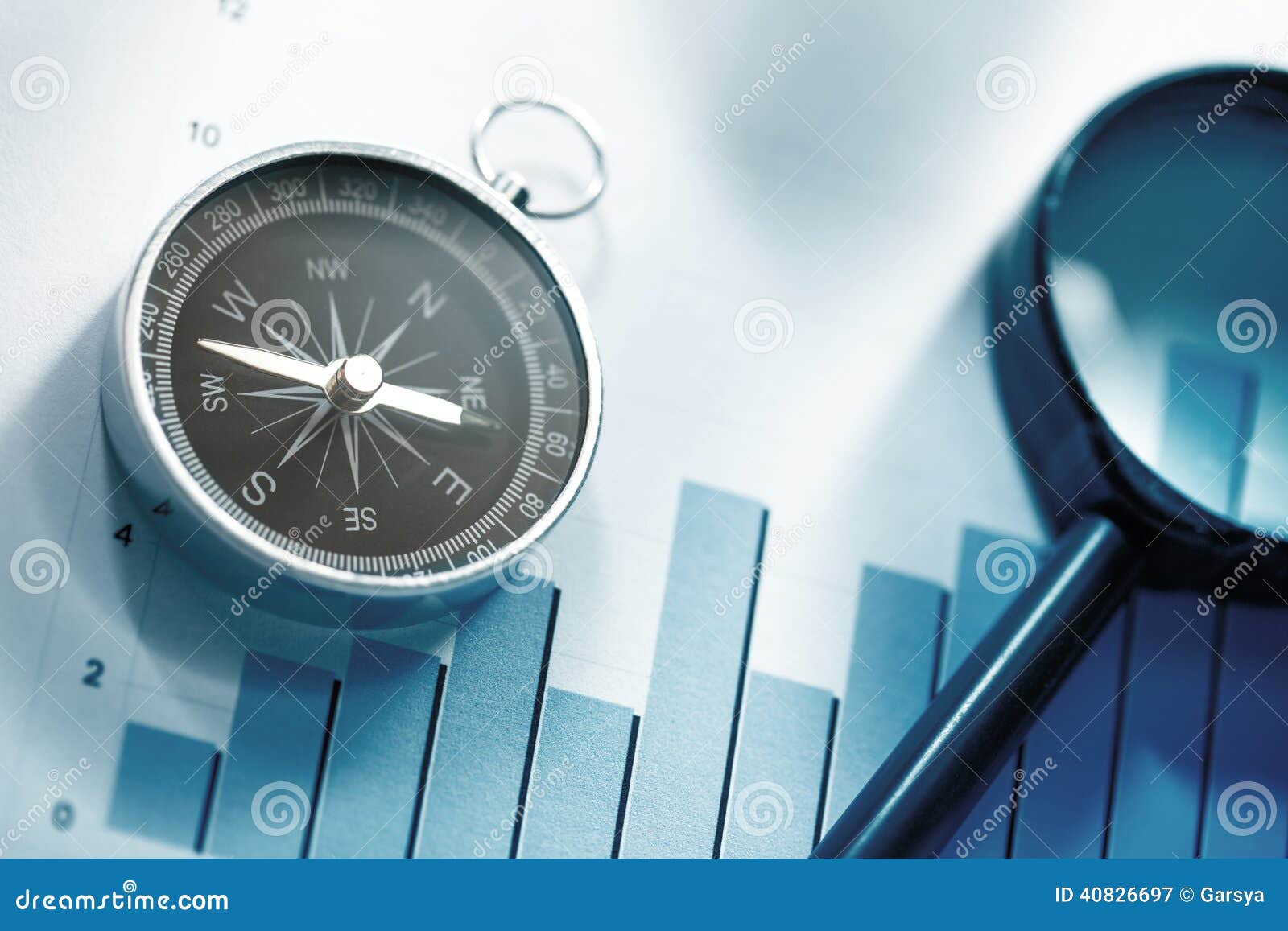 Lens And Compass On A Map ! Stock Image | CartoonDealer.com #661531